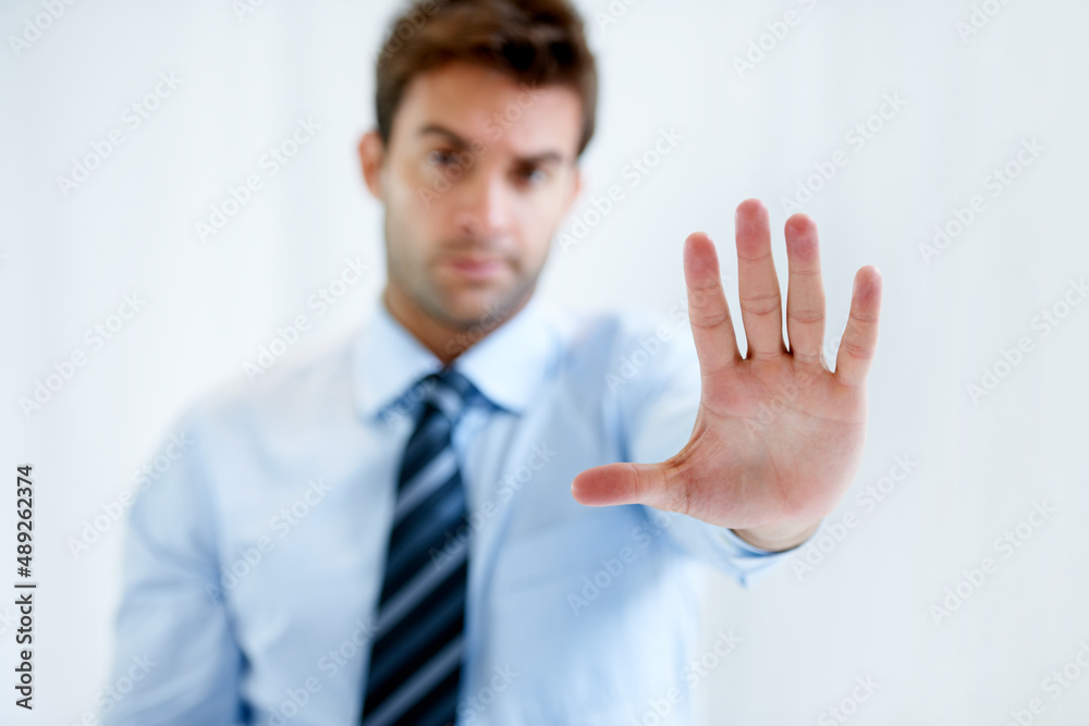 Know your limits. Portrait of a businessman with a stern expression and ...