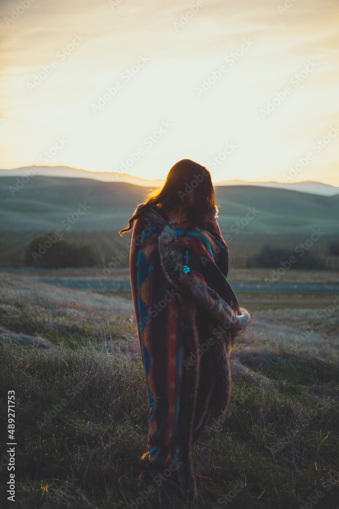 woman in the sunset Stock Photo | Adobe Stock