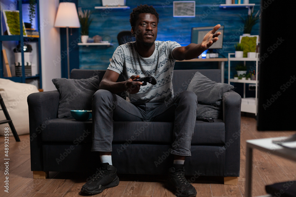 Upset sad player making furious gesture after losing virtual gaming ...