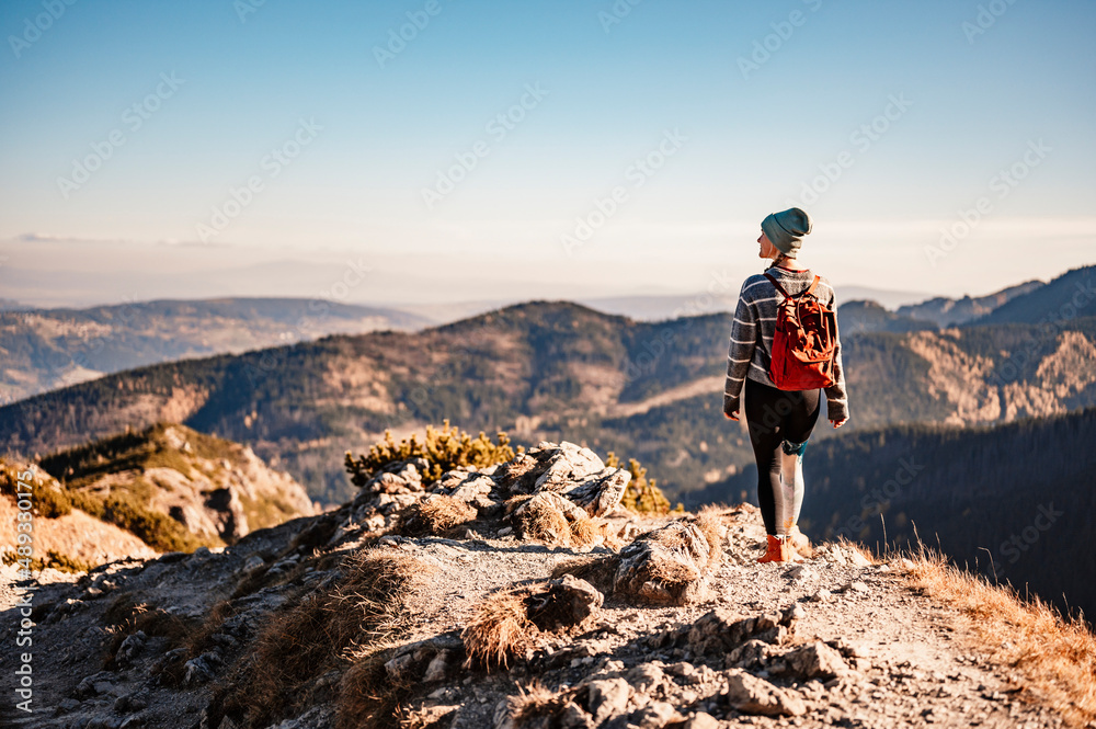 Traveler hiking with backpacks. Hiking in mountains. Sunny landscape ...