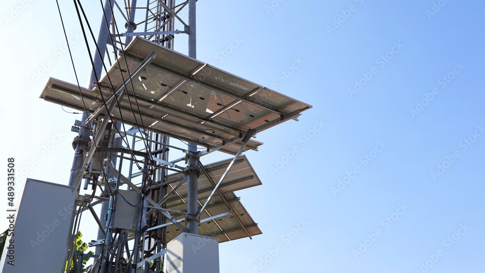 Solar panels in telecommunication base stations. Multiple photovoltaic ...