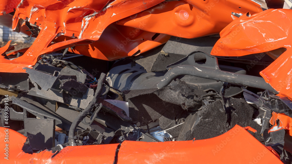 Orange car crash background. Close-up detail of auto wreck. Front side ...