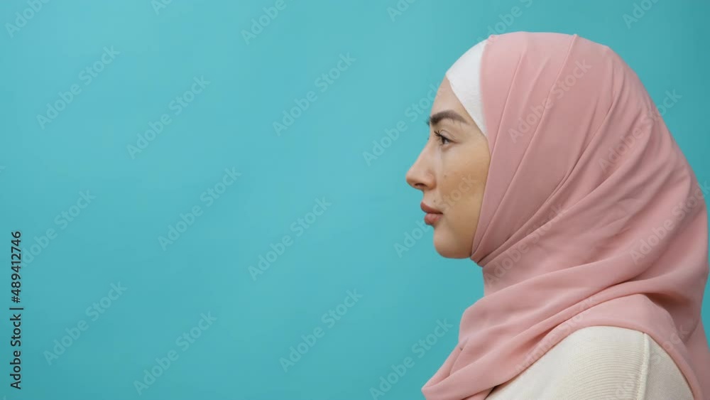 Close up side view profile charming beautiful young Young Muslim woman ...