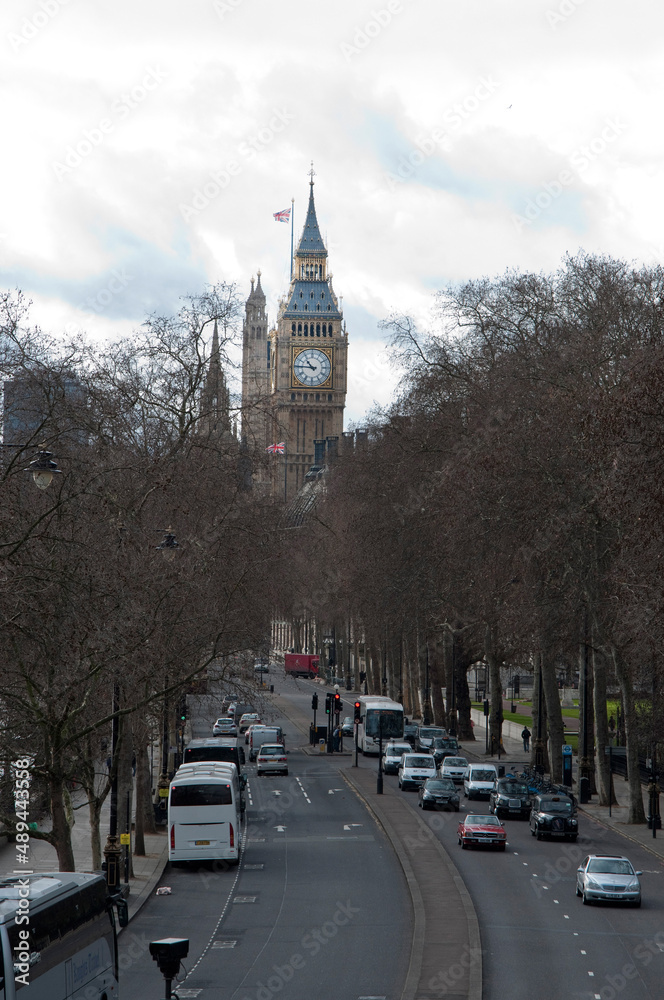 Aerial view of a wide street in London, with trees at both sides. Big ...