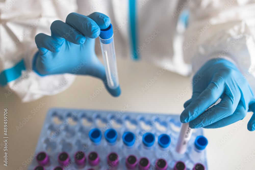 Process of coronavirus PCR antigen testing examination by nurse medic ...