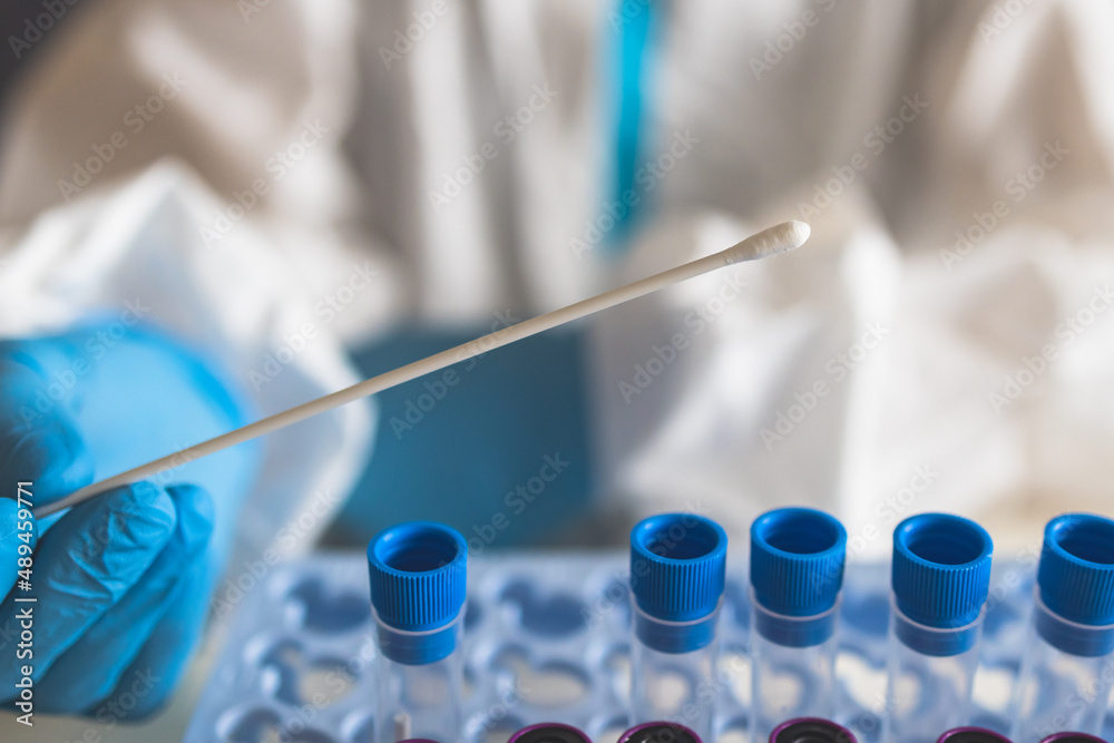 Process of coronavirus PCR antigen testing examination by nurse medic ...