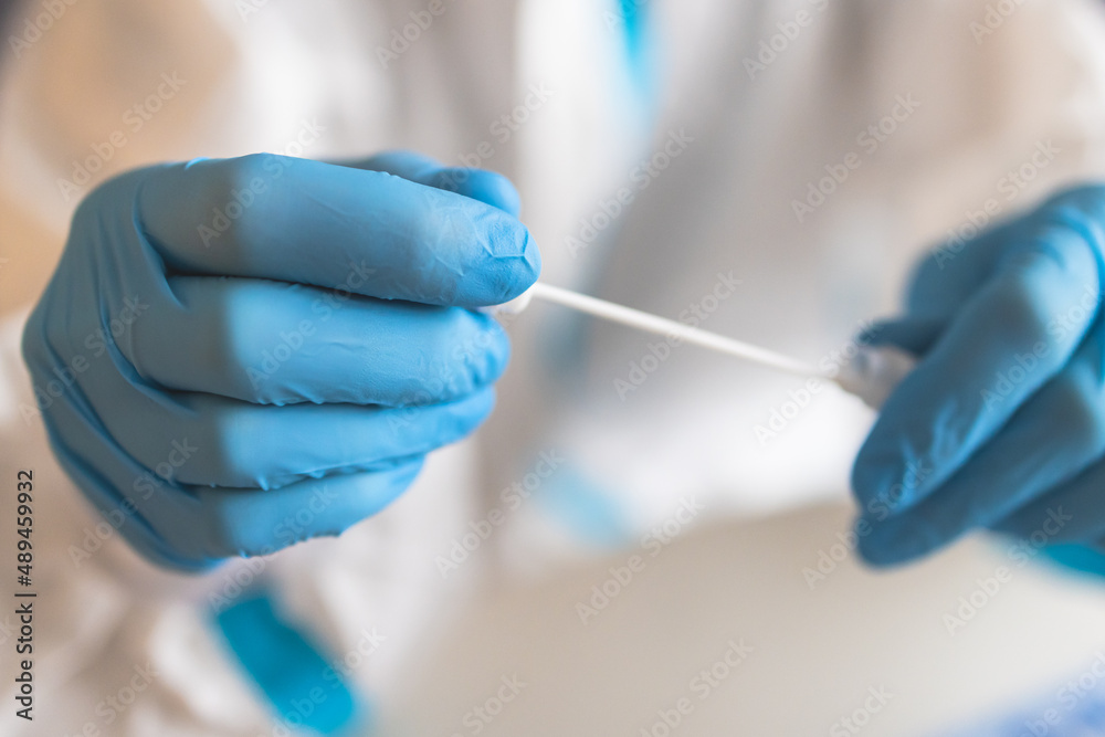 Process of coronavirus PCR antigen testing examination by nurse medic ...