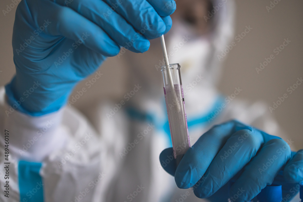 Process of coronavirus PCR antigen testing examination by nurse medic ...