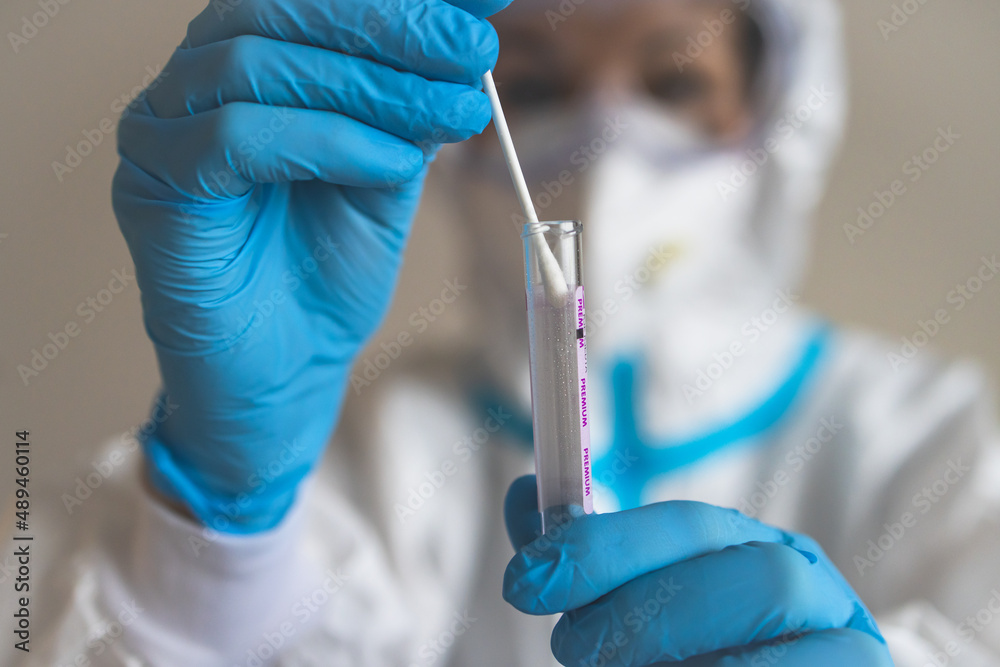 Process of coronavirus PCR antigen testing examination by nurse medic ...
