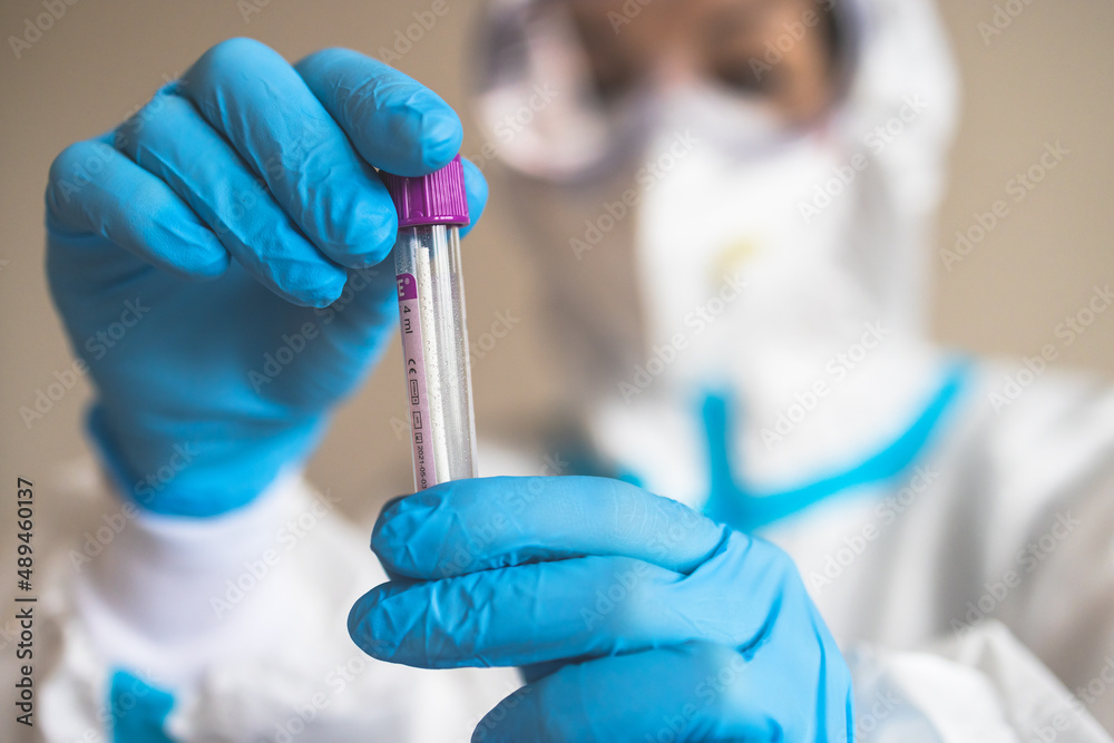 Process of coronavirus PCR antigen testing examination by nurse medic ...