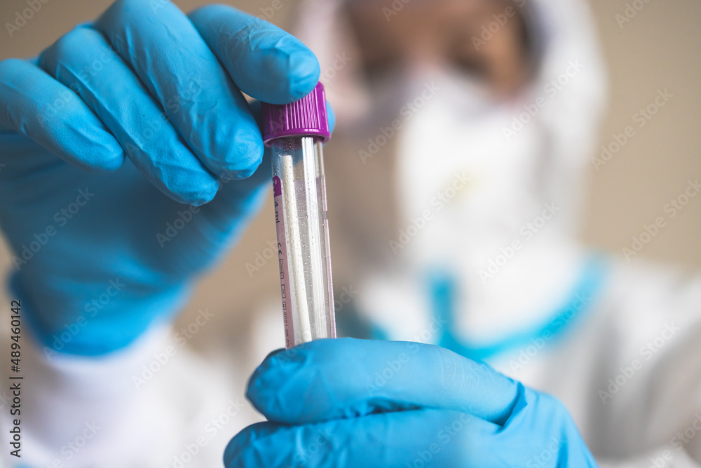 Process of coronavirus PCR antigen testing examination by nurse medic ...
