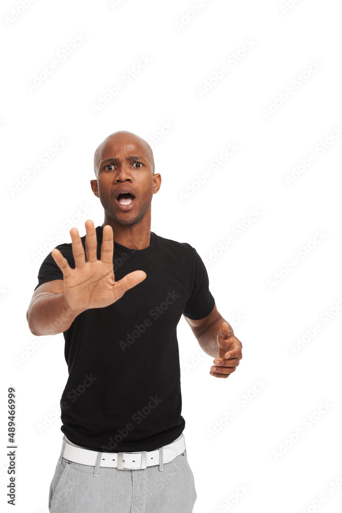 Whoa, not so fast. Studio shot of a upset african american man making a ...