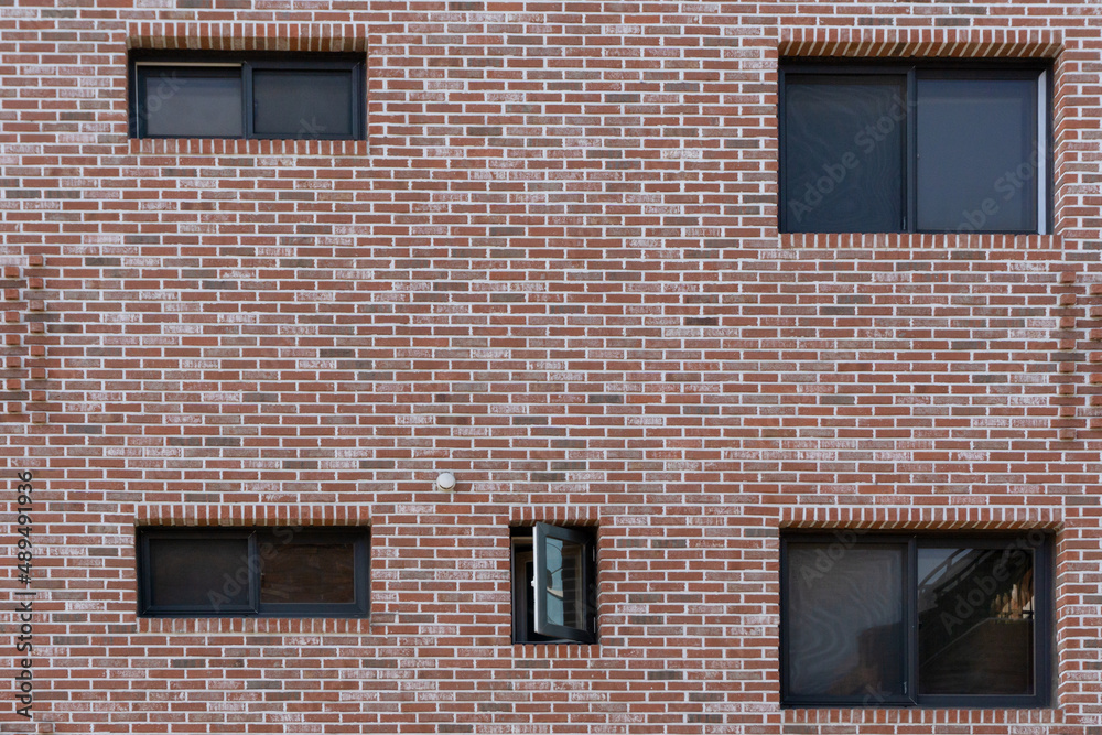 window frame installed on the wall of a building Stock Photo | Adobe Stock