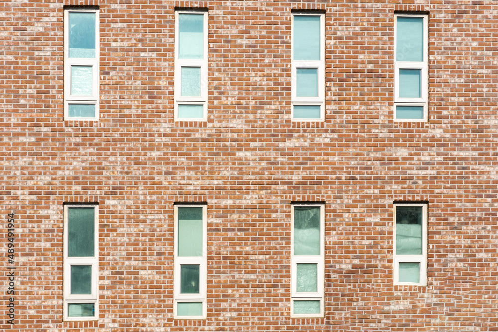 window frame installed on the wall of a building Stock Photo | Adobe Stock