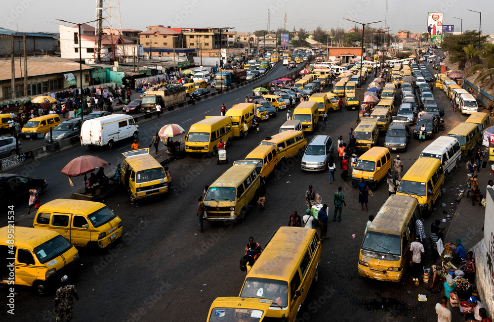 Lagos city bus park - Endless Streams of danfo navigating the bustling ...
