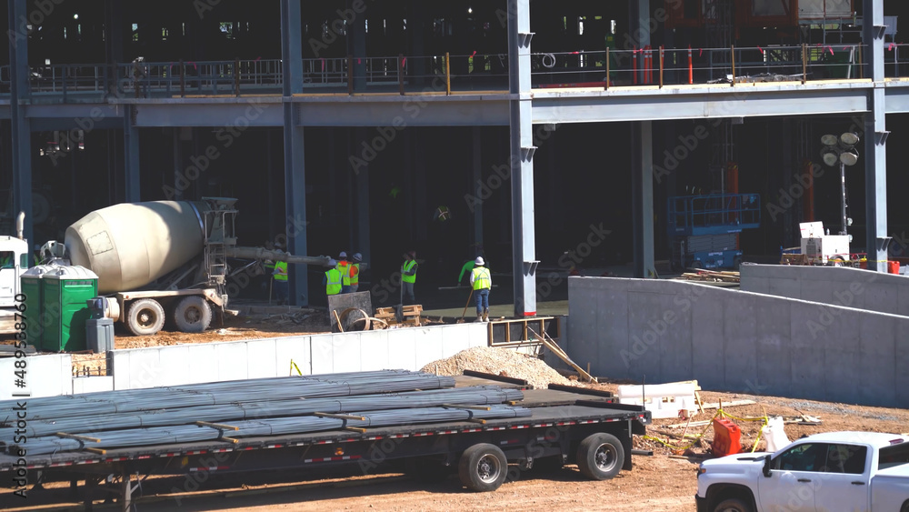 large construction site background, concrete and steel structure of a ...