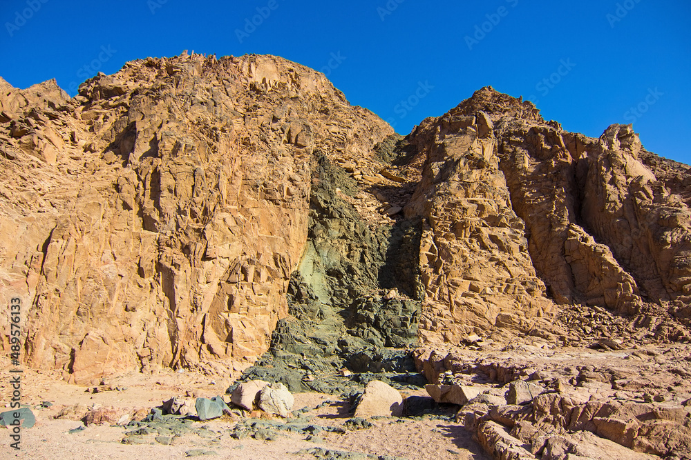Colored canyon with red limestone and black basalt rocks, Nabq ...