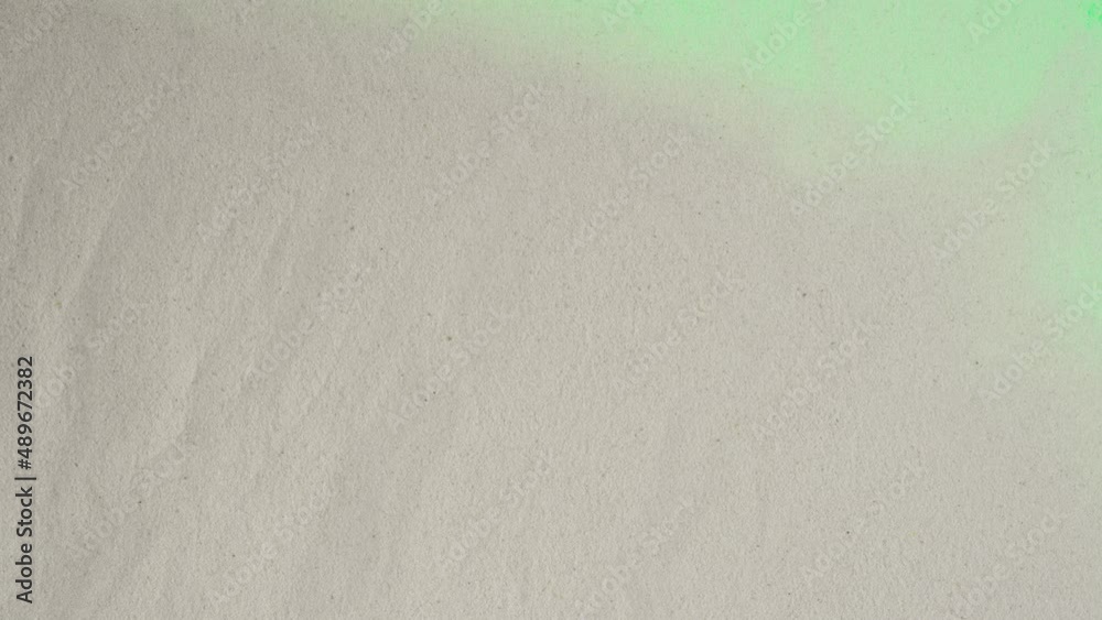 White sand filling green screen chroma key background. Advertising area ...
