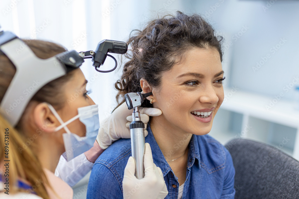 Hearing exam for a woman. Diagnosis of impairment and hearing testing ...