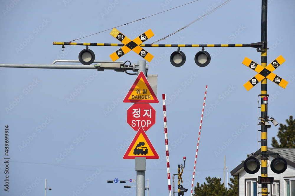 Railroad crossing traffic sign Stock Photo | Adobe Stock