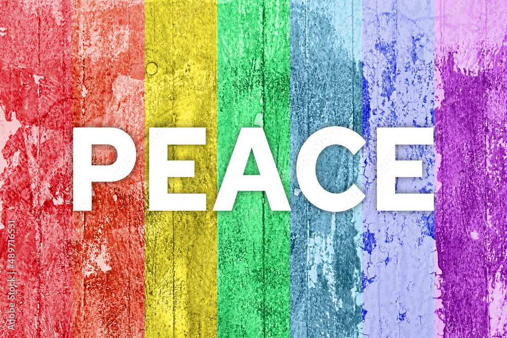 Peace background. White Peace word on rainbow colors wooden background ...