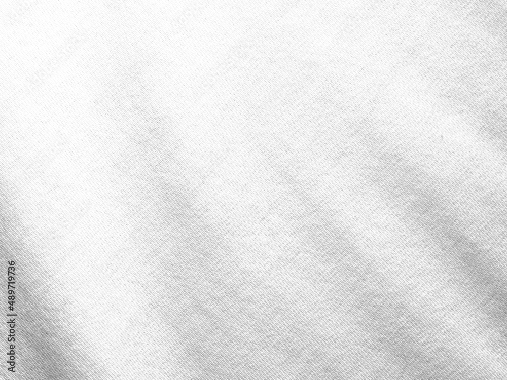White fabric texture with exposed fibers in a close up full frame view ...