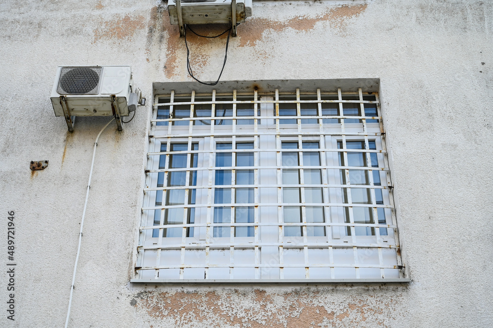 Jail window. Metal bars on windows. Window in old prison cell. Security grids. Stock Photo ...