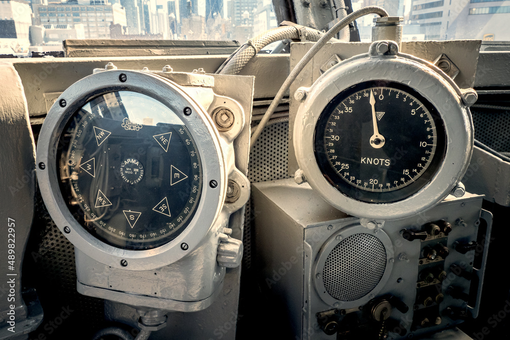 View of the large speedometer and compass rose on the bridge of the USS ...