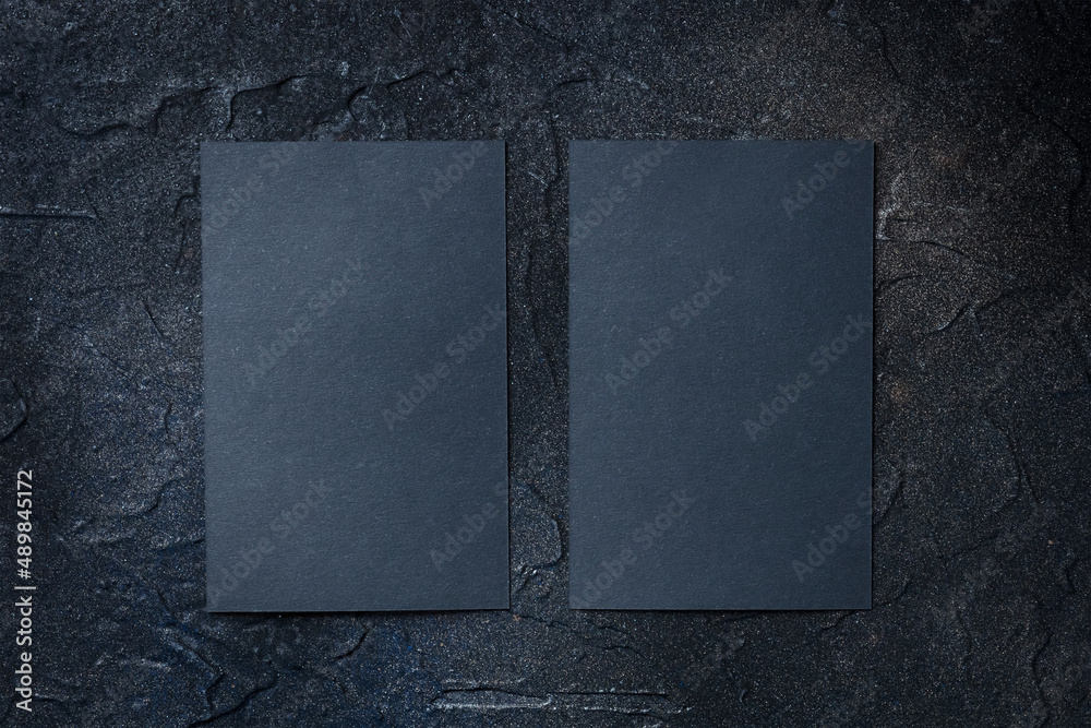 Black business cards mockup, front and back, vertical, on a dark ...