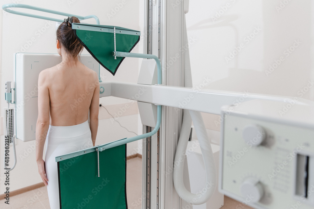 Hospital Radiology Room. Xray machine for fluorography. Woman patient ...
