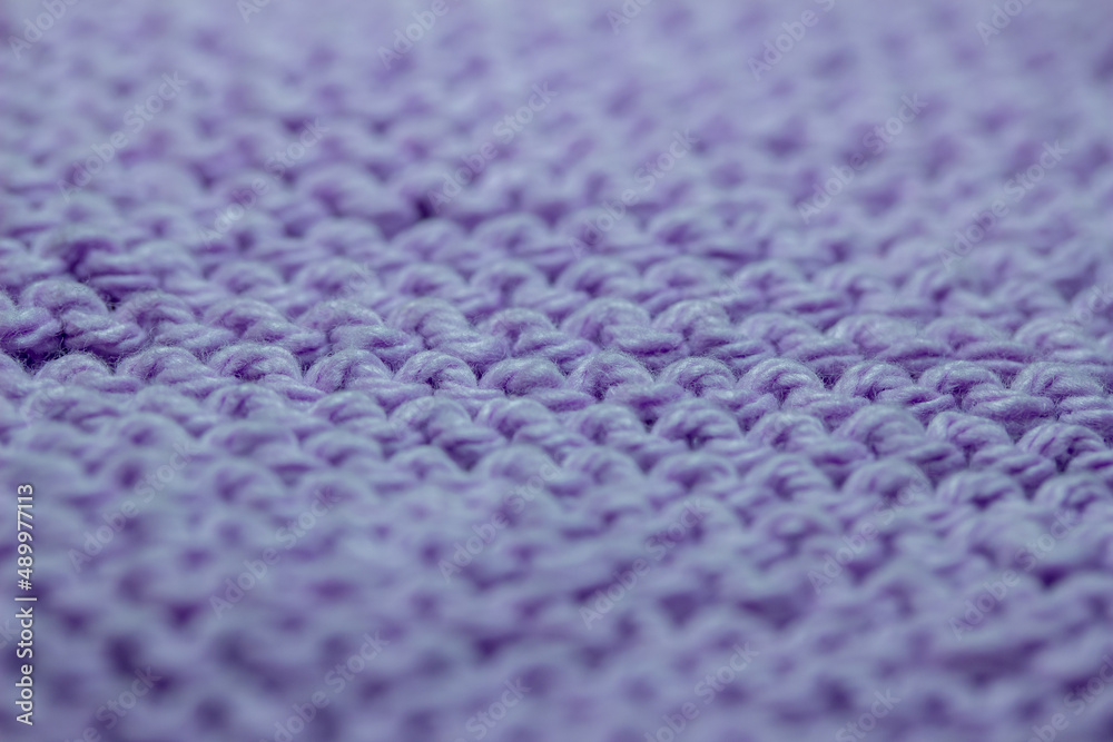 Macro abstract background of hand-knitted yarn fabric texture with a ...
