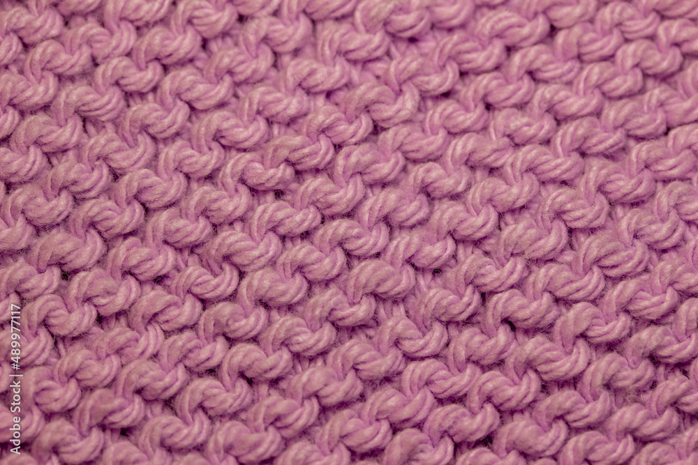 Macro abstract background of hand-knitted yarn fabric texture with a ...
