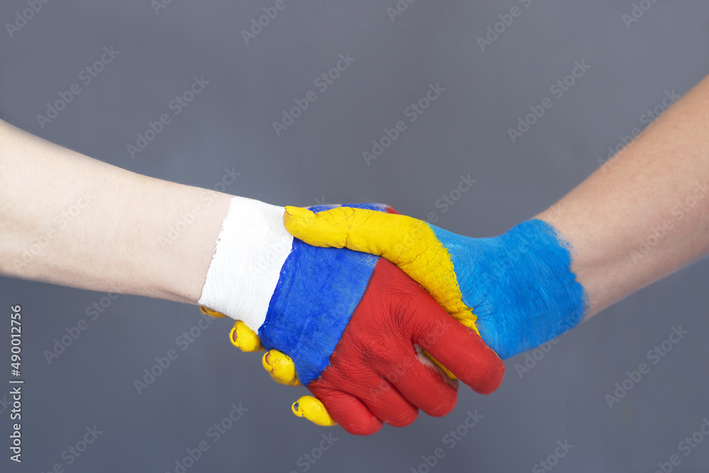 Russia and Ukraine shaking hands. Peace symbol, stop war concept ...