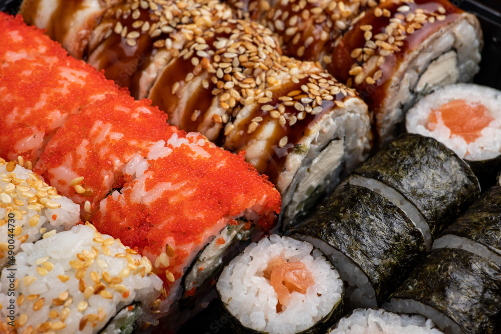 Japanese sushi food. Maki ands rolls with tuna, salmon, shrimp, crab ...