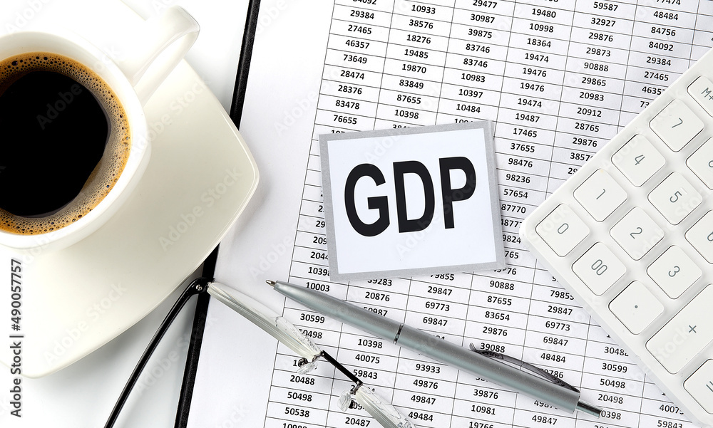 GDP text on sticky on chart with coffee,pen and calculator Stock Photo ...