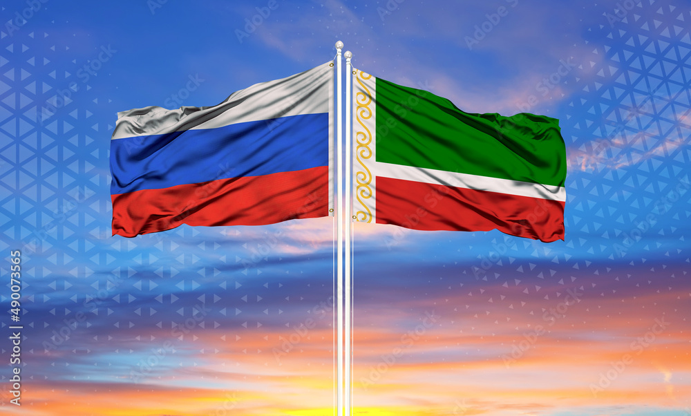 Russia and Chechnya two flags on flagpoles and blue cloudy sky Stock ...