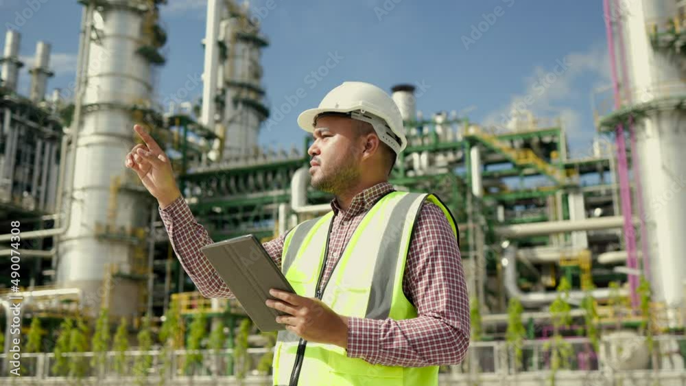 Asian engineer manager man with white safety helmet standing front of ...