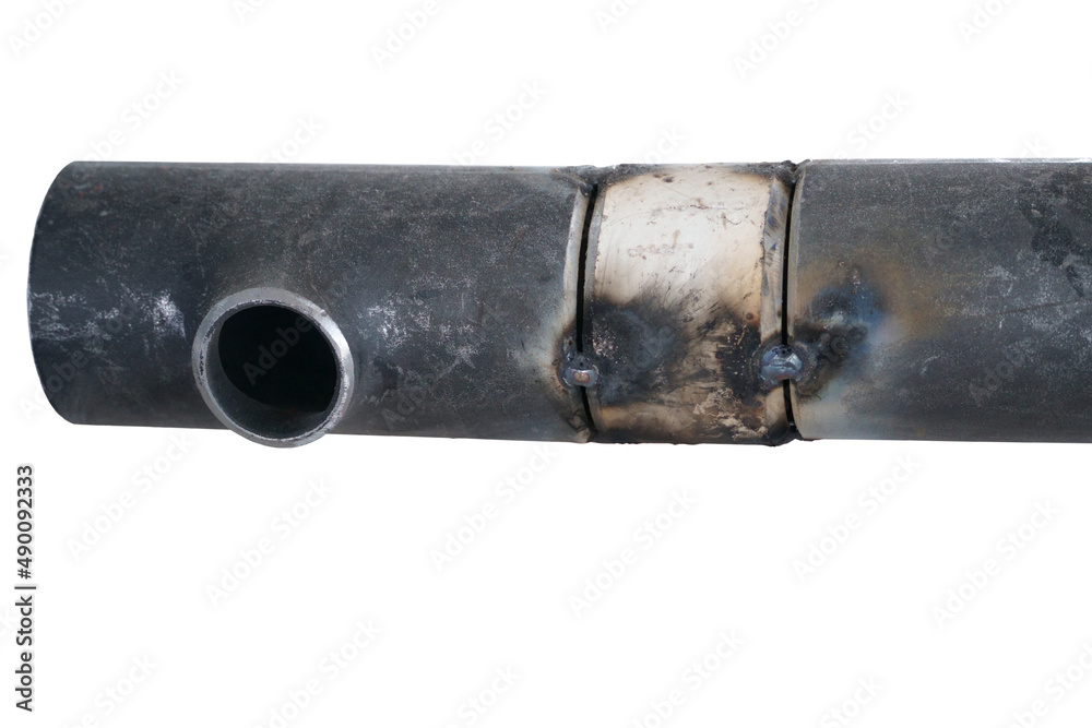 Steel rings are welded together to create a strong water line for ...