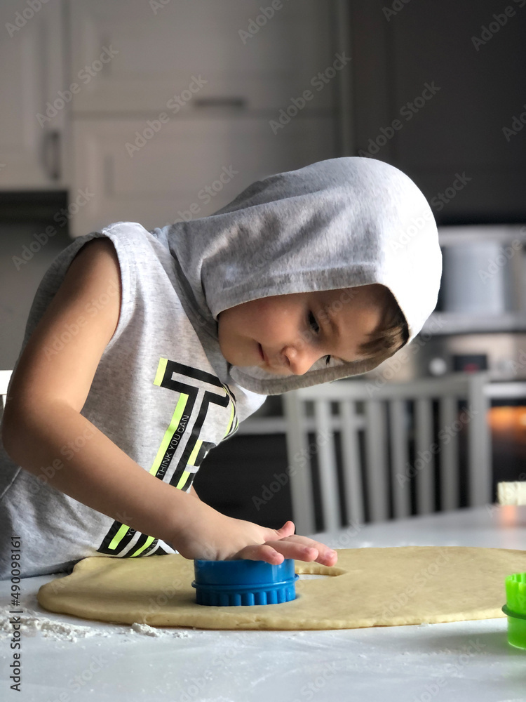 boy cooking Stock Photo | Adobe Stock