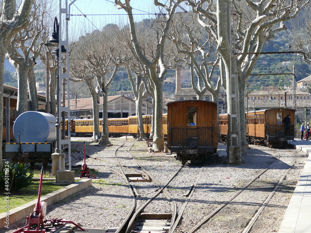 Two trains and narrow gauge tracks of the historic tren de Soller ...