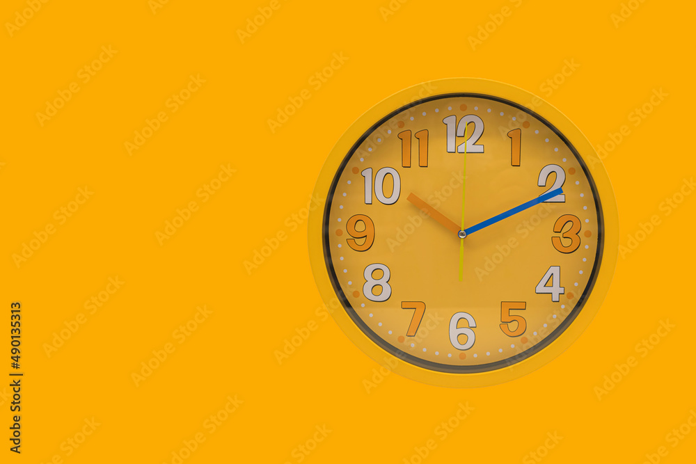clock arrow wall on a solid background Stock Photo | Adobe Stock
