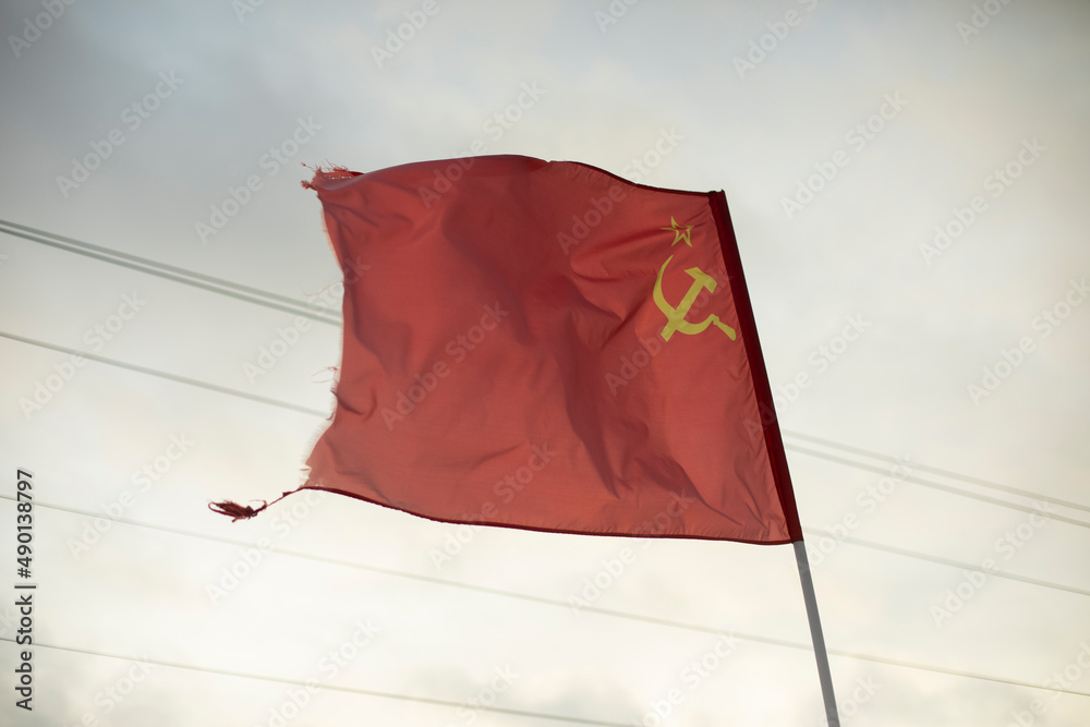Red banner with hammer and sickle. Flag of Soviet Union. Old symbol of ...