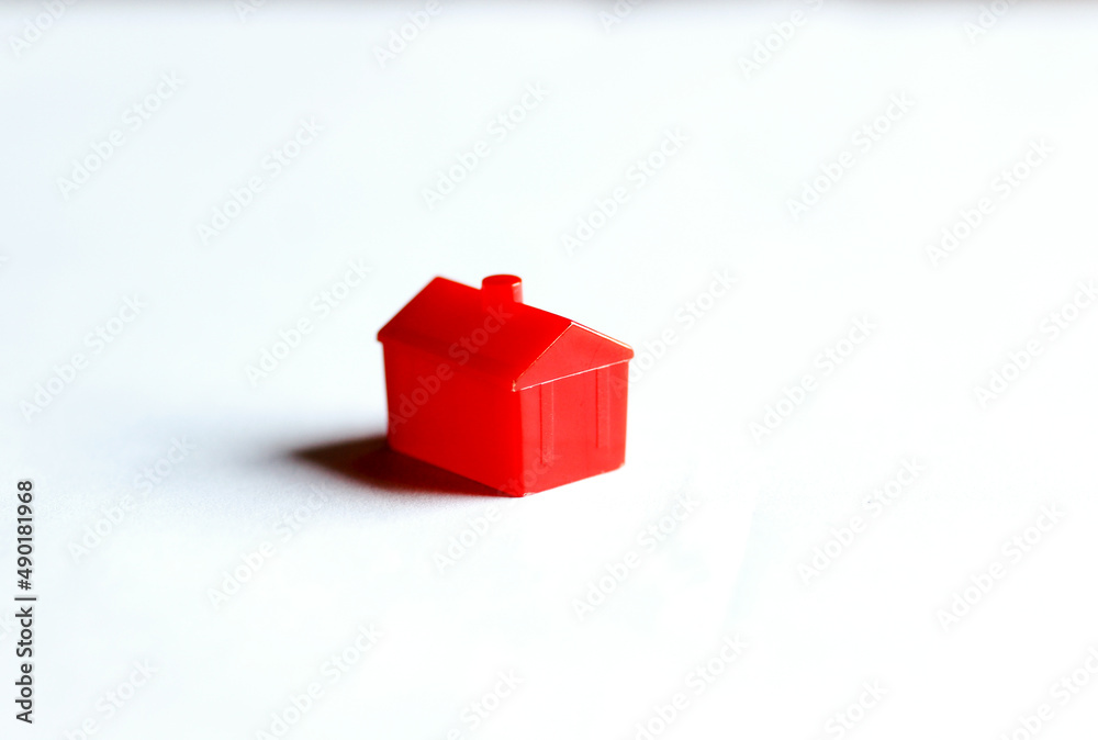 Red toy house on white background with shadow Stock Photo | Adobe Stock