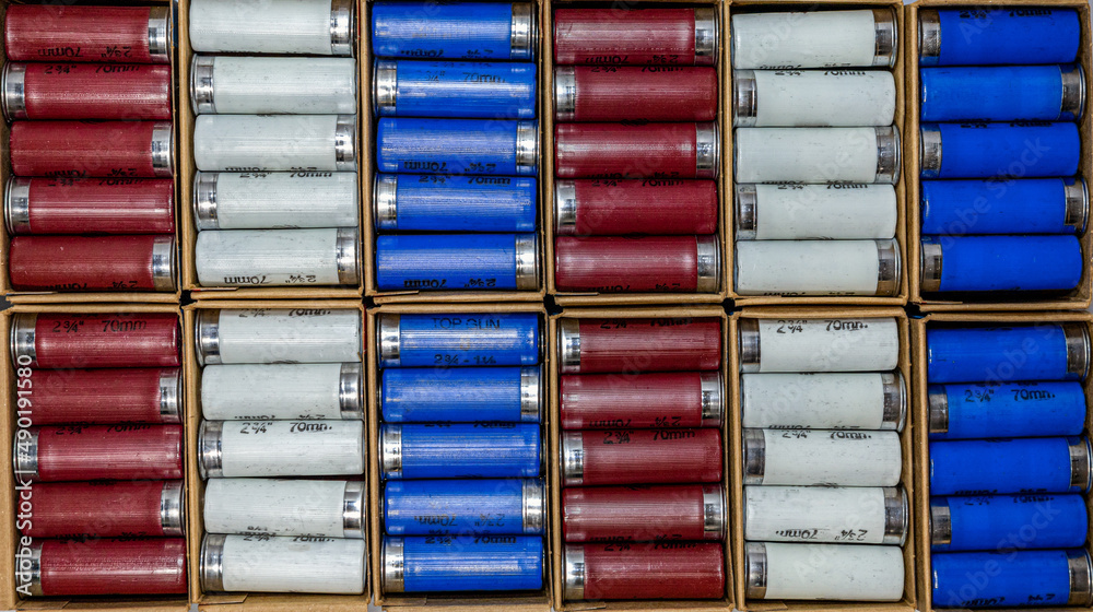 Red, white and blue shotgun shells. Background Stock Photo | Adobe Stock