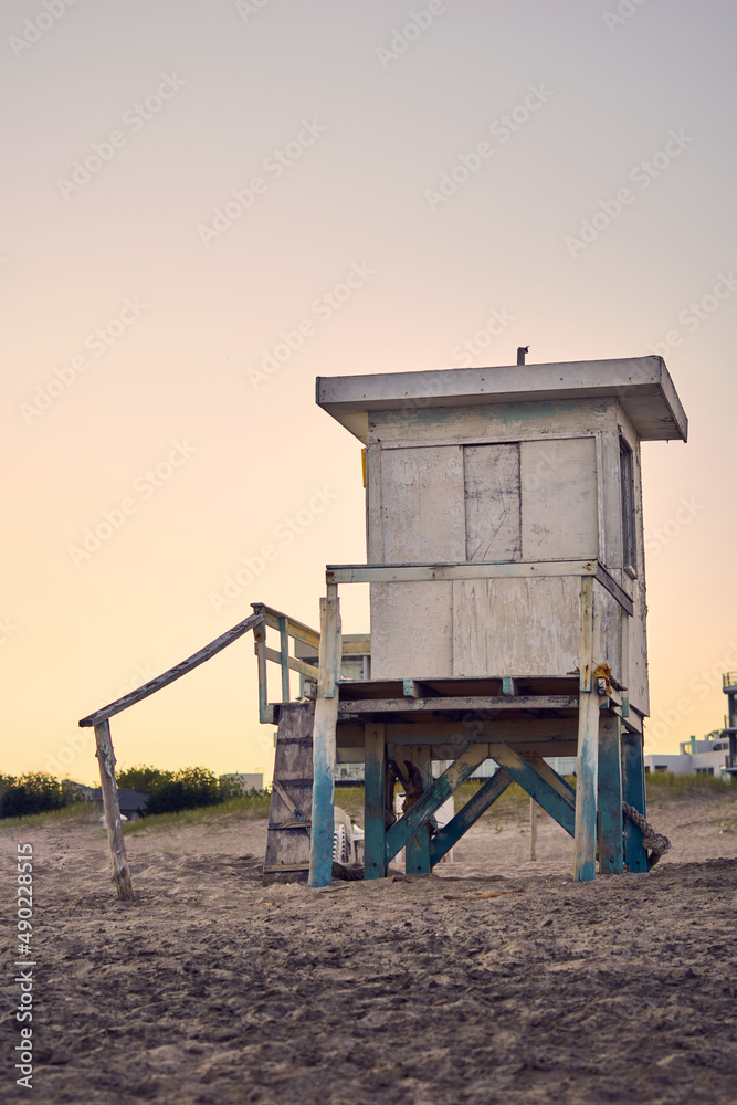 Wooden lifeguard observation tower on sandy beach Stock Photo | Adobe Stock