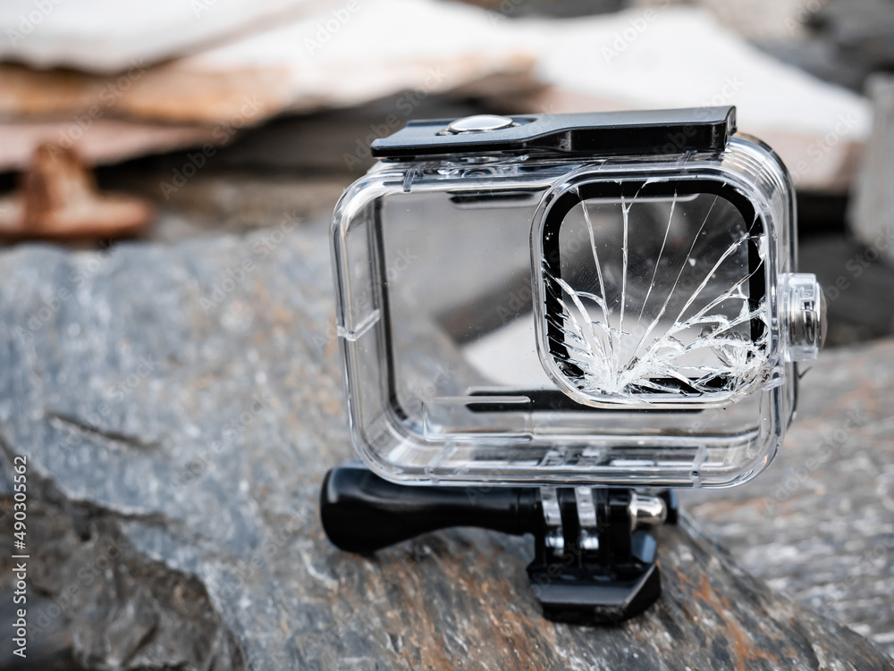Transparent casing of a sports camera destroyed and unusable due to the ...