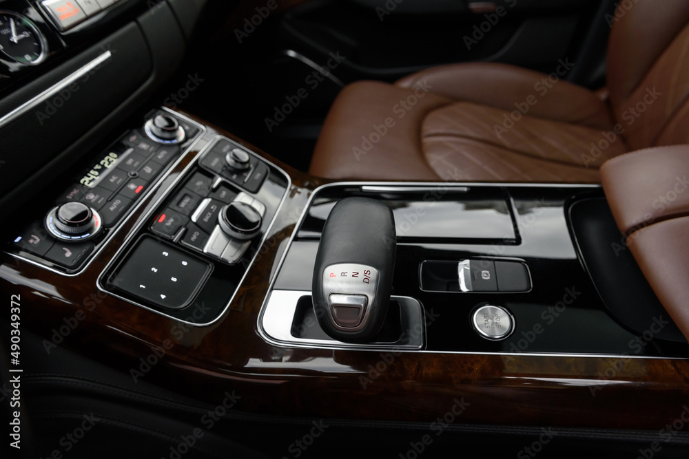 Gear shift lever for automatic transmission. Engine start button close ...
