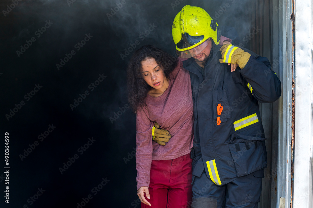 Firefighter emergency rescue help young woman from dangerous smoke and ...