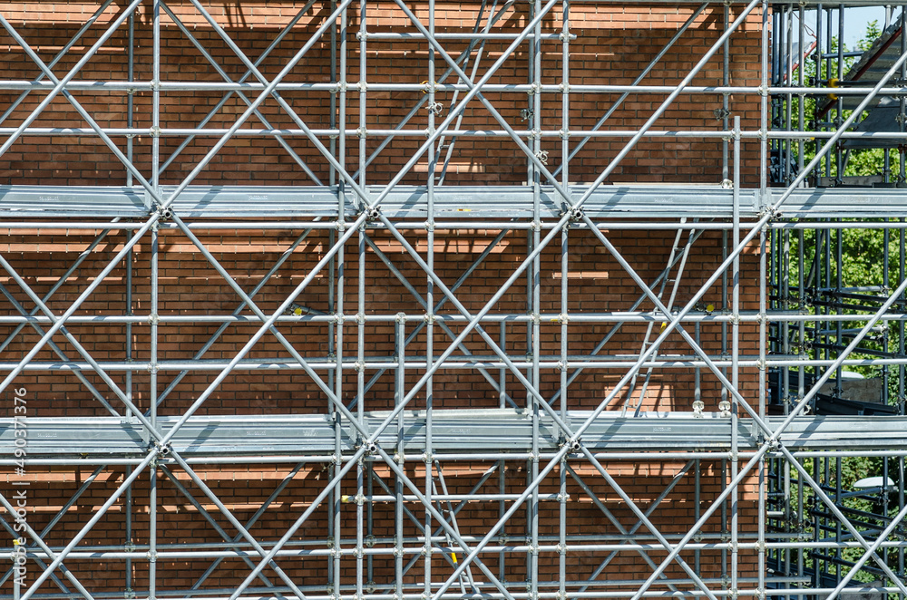 buildings: the scaffolding is for the safety at work of the workers ...