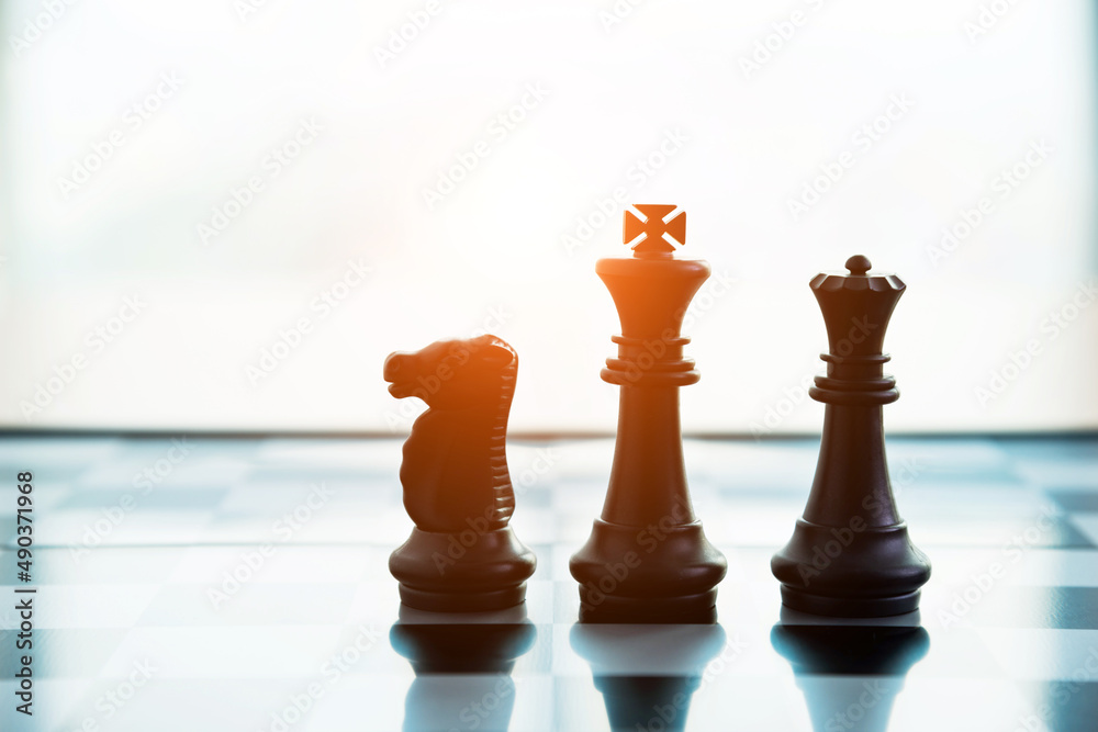King, queen, knight on chess board Stock Photo | Adobe Stock